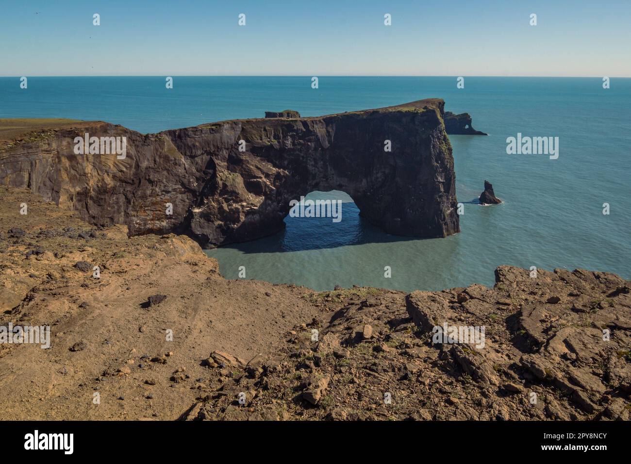 Arch cliff on ocean beach landscape photo Stock Photo - Alamy