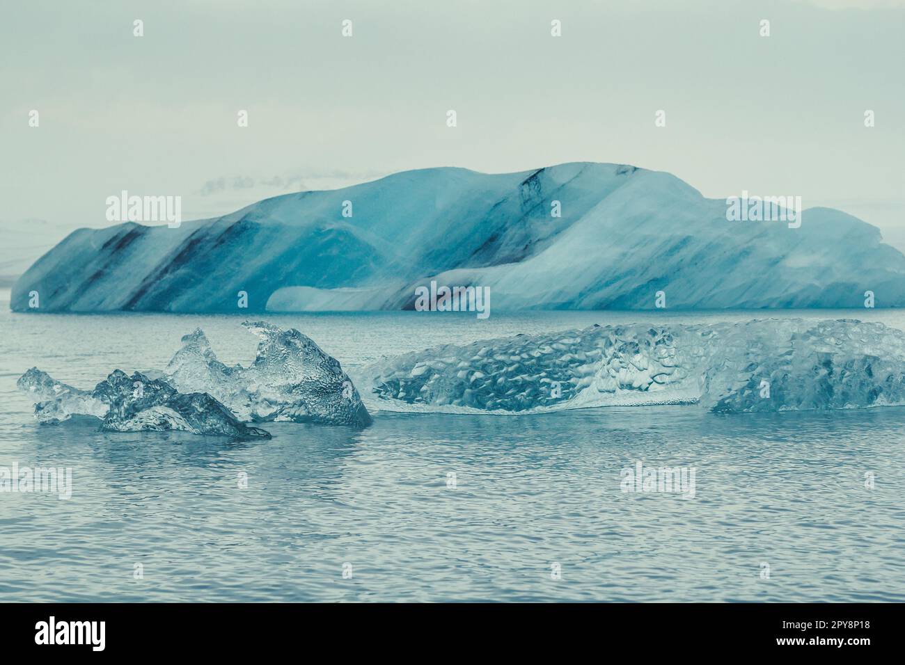 Floating ice pieces in ocean landscape photo Stock Photo - Alamy