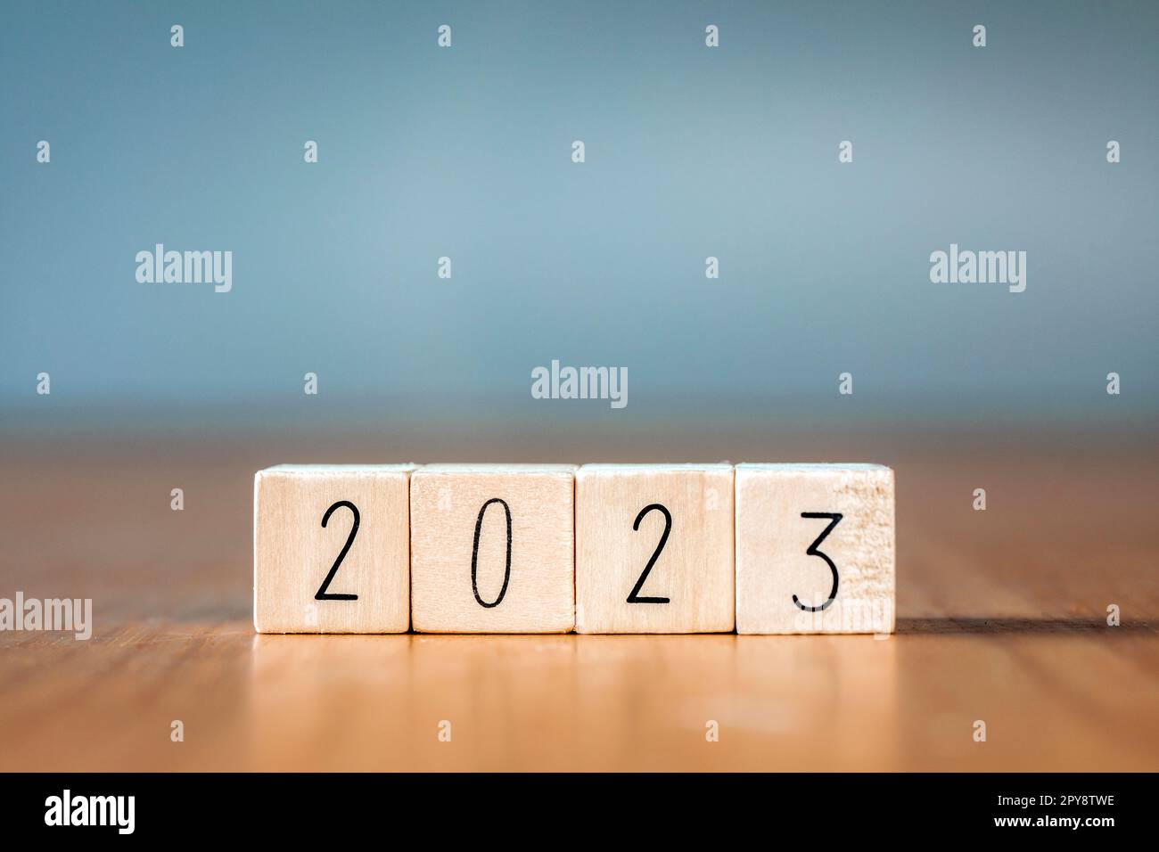 2023 New Year. wooden blocks 2023 on blue background. Start new year ...