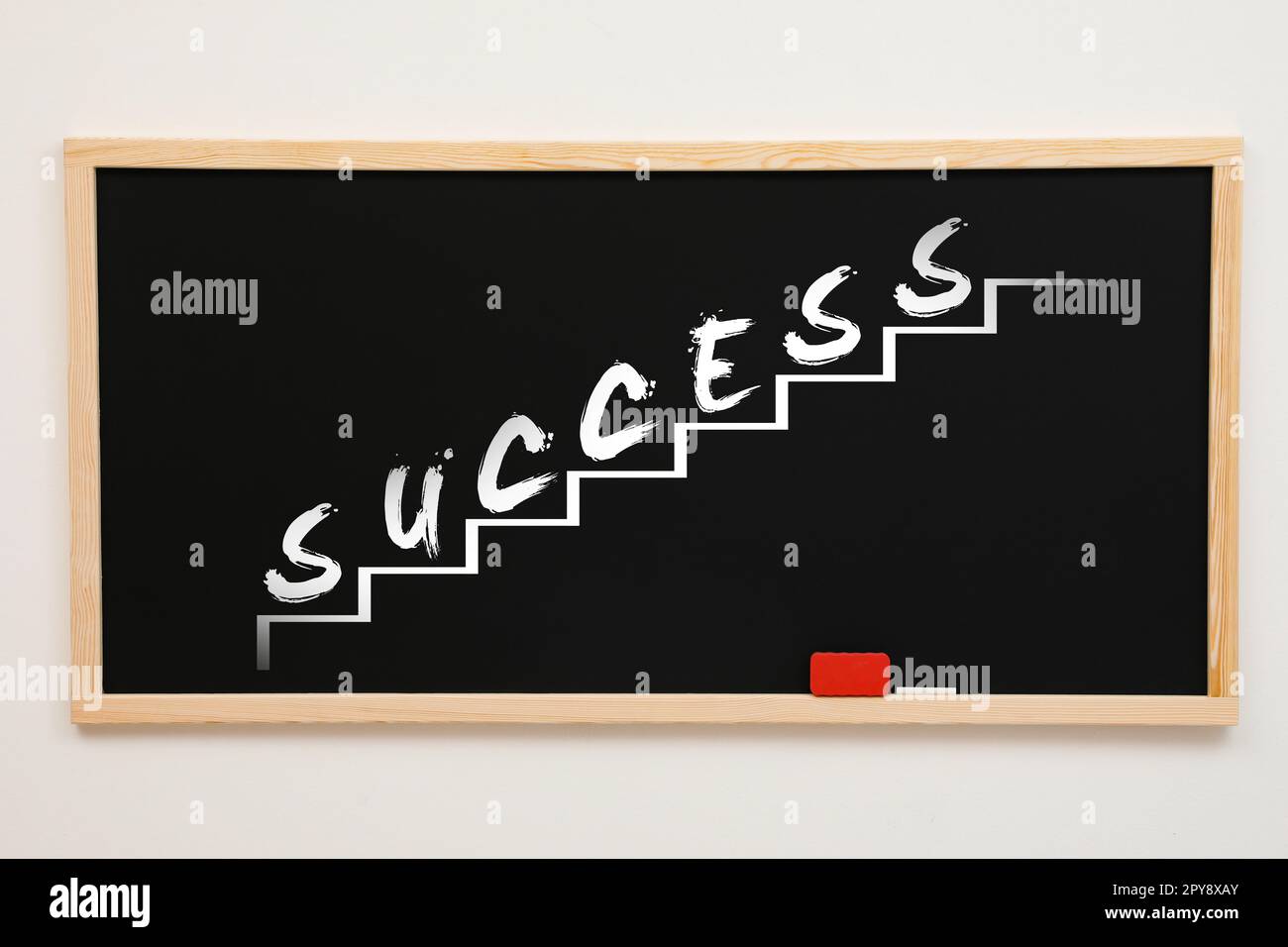 Stairs with word Success drawn on chalkboard against white background ...