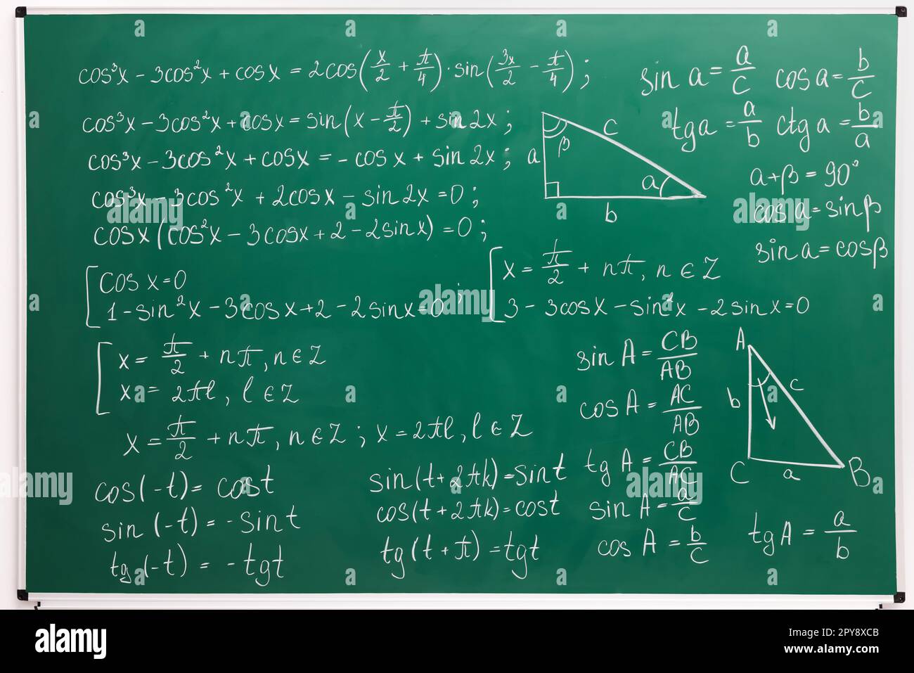 Many different math formulas written on green chalkboard Stock Photo ...