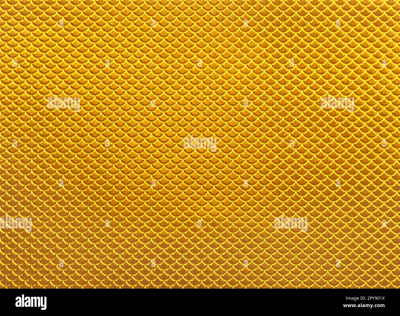 Abstract background of golden, scale pattern Stock Photo - Alamy