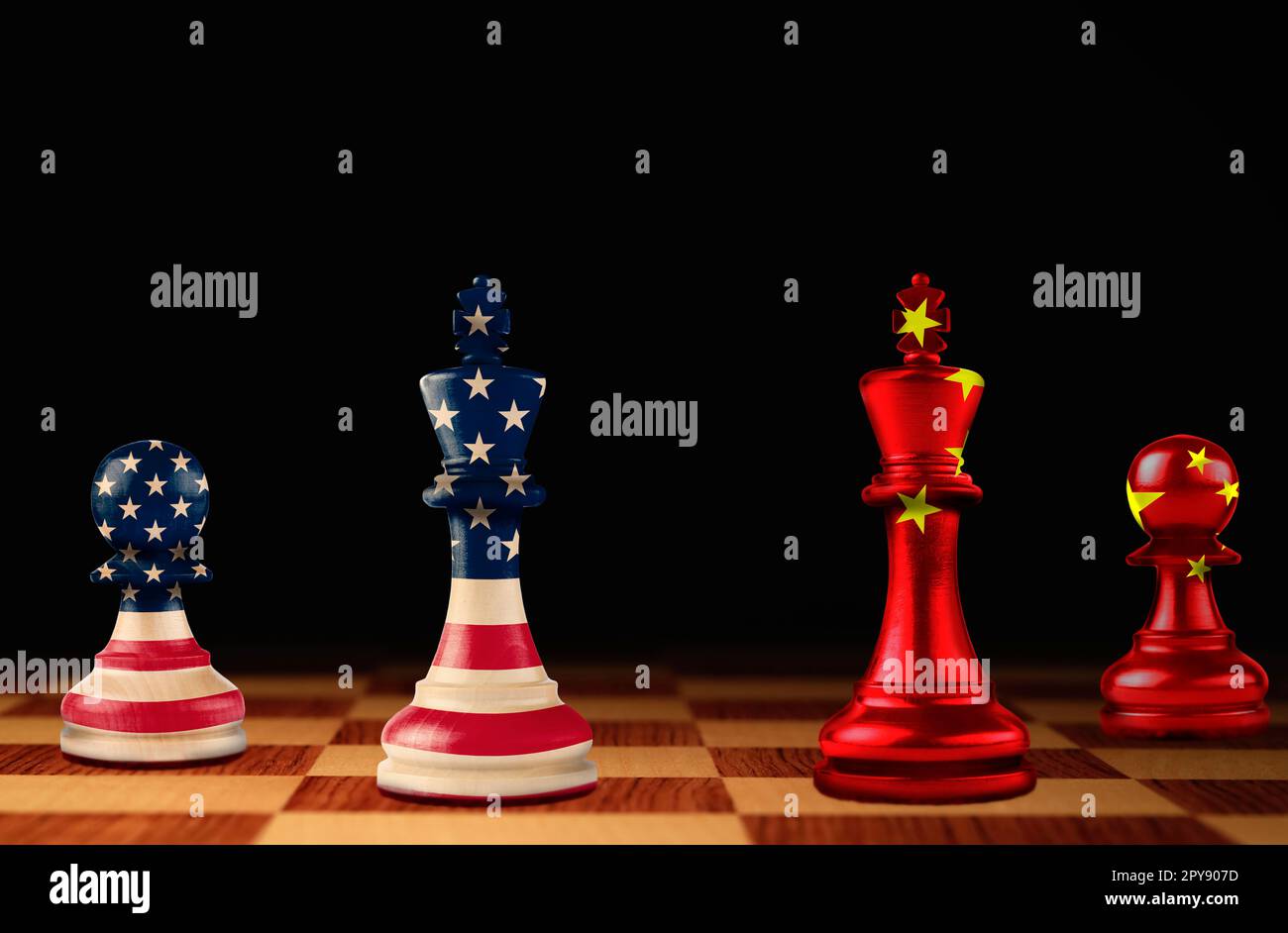 Chess pieces in color of national flags on board against black ...