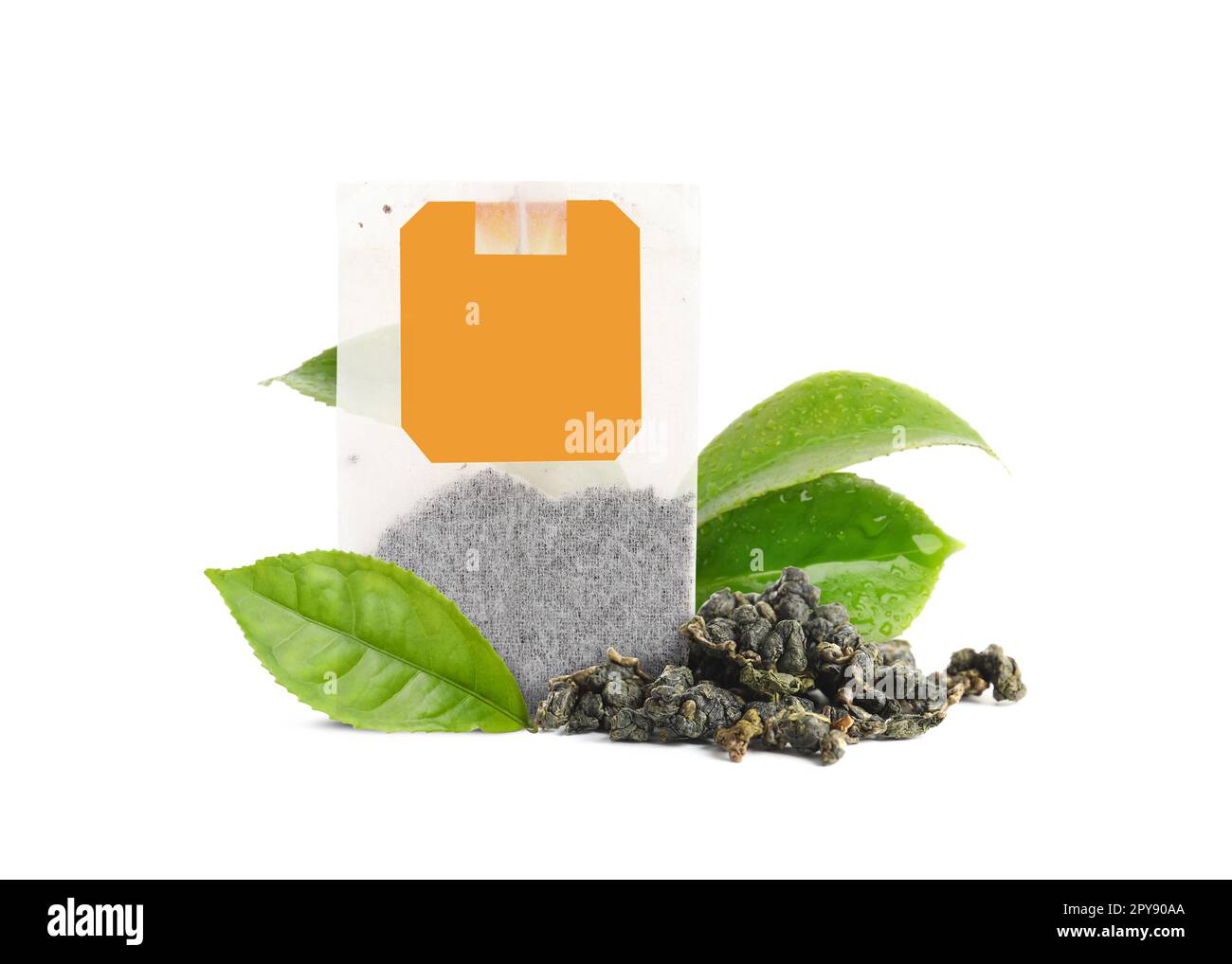 Tea bag with leaves on white background Stock Photo - Alamy