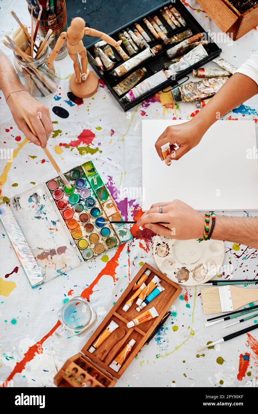 Creativity is messy and we are very creative. High angle shot of an ...