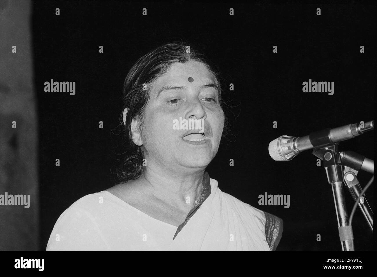 Female politician speaking microphone hi-res stock photography and ...