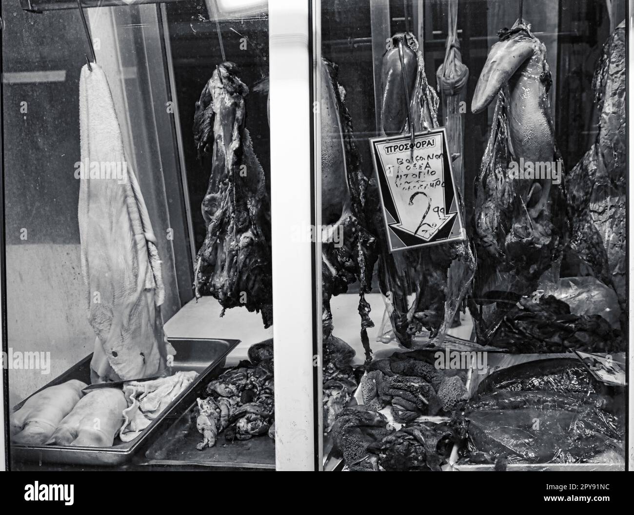 Butcher's glass cabinet with offal on display in Athen's central market ...