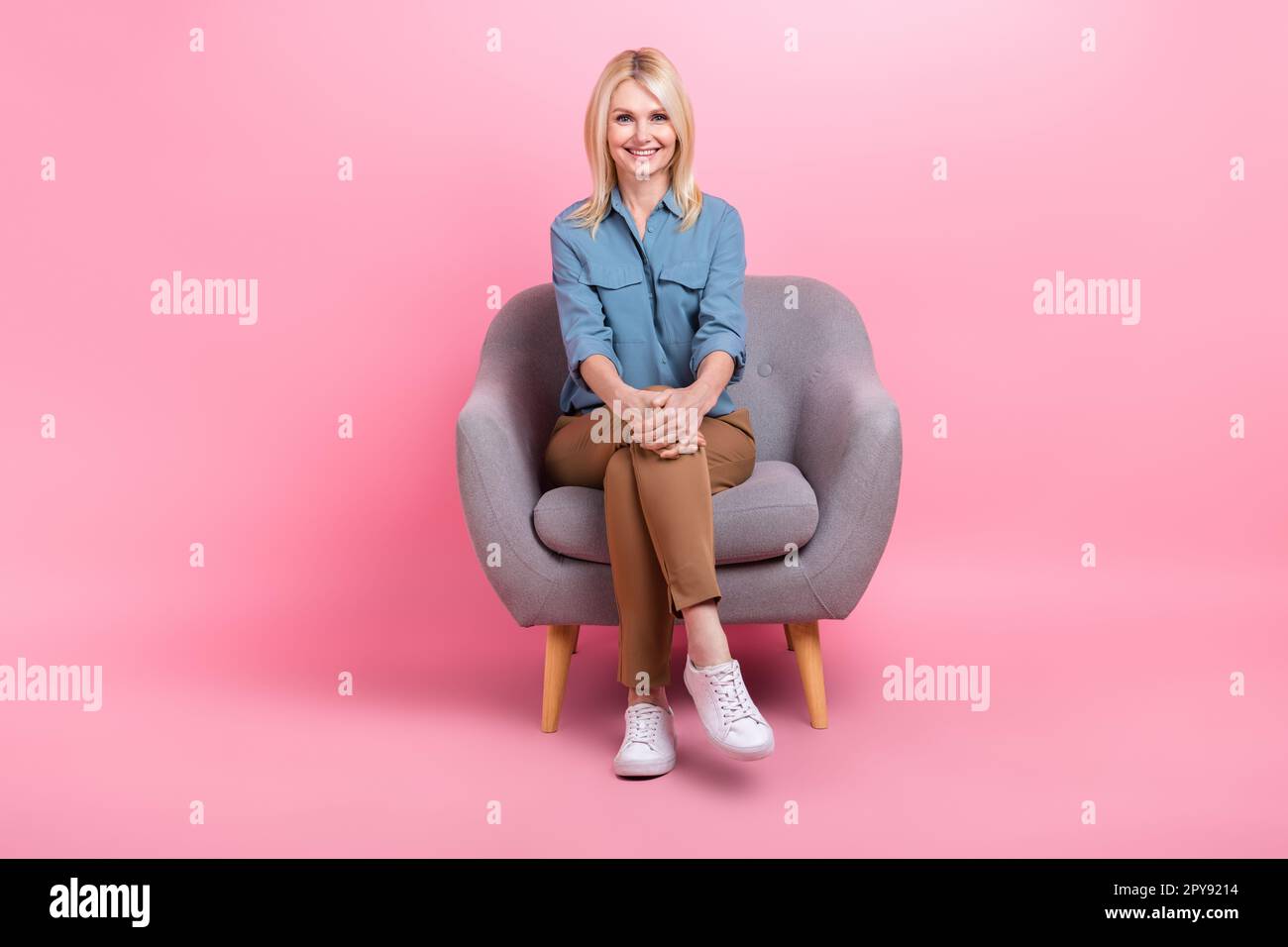 Photo of attractive senior lady sit armchair office listen candidate ...