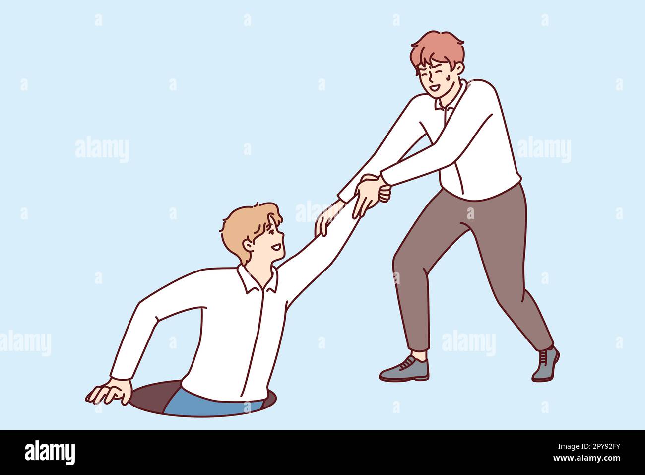 Man saves friend fell into hatch in ground, extending helping hand in difficult situation. Young ...