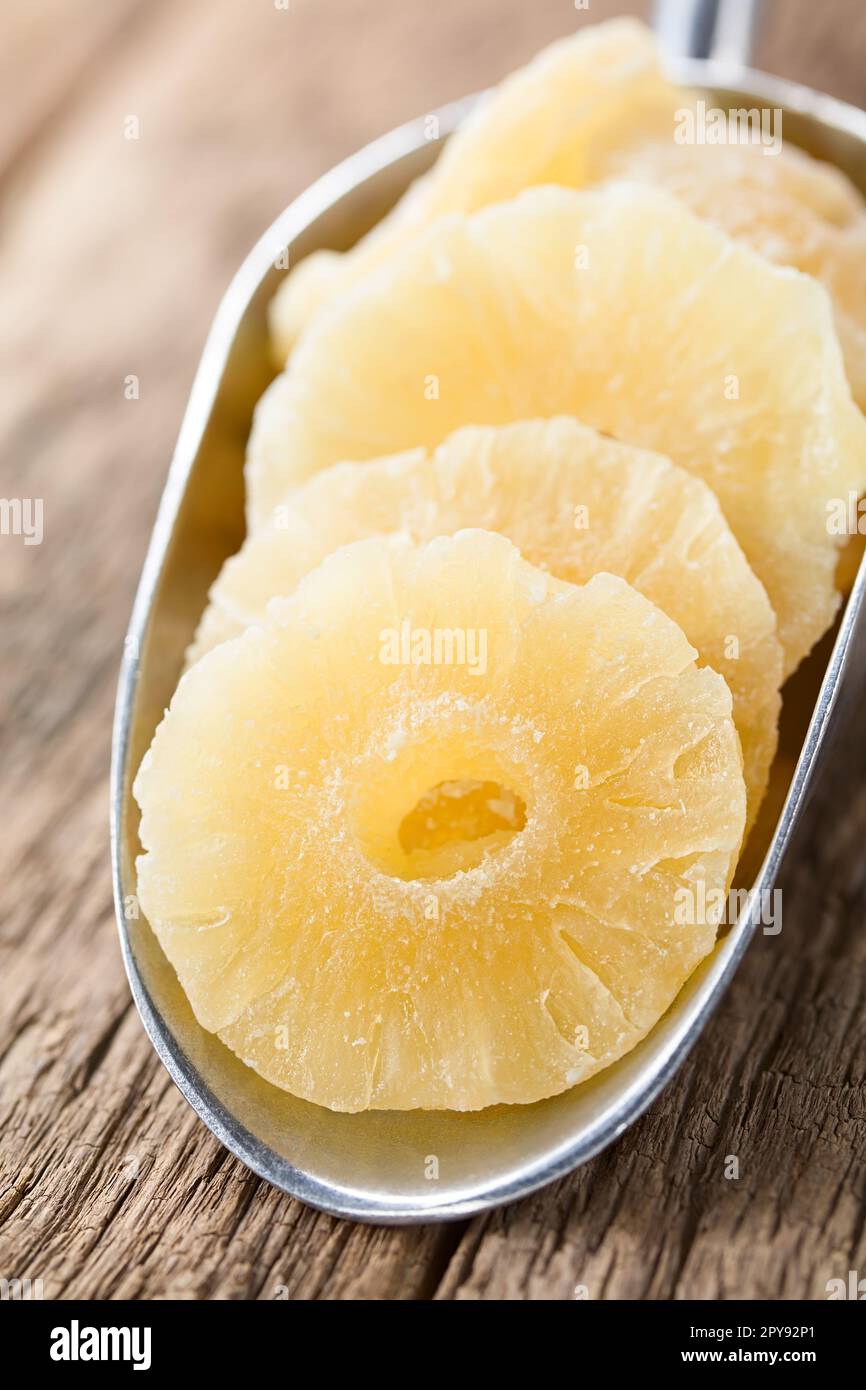 Candied Pineapple Slices in Metal Scoop Stock Photo - Alamy