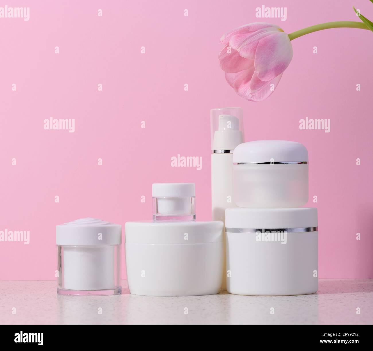 White plastic tube, jar for cosmetics. Container for gel, cream, tonic ...