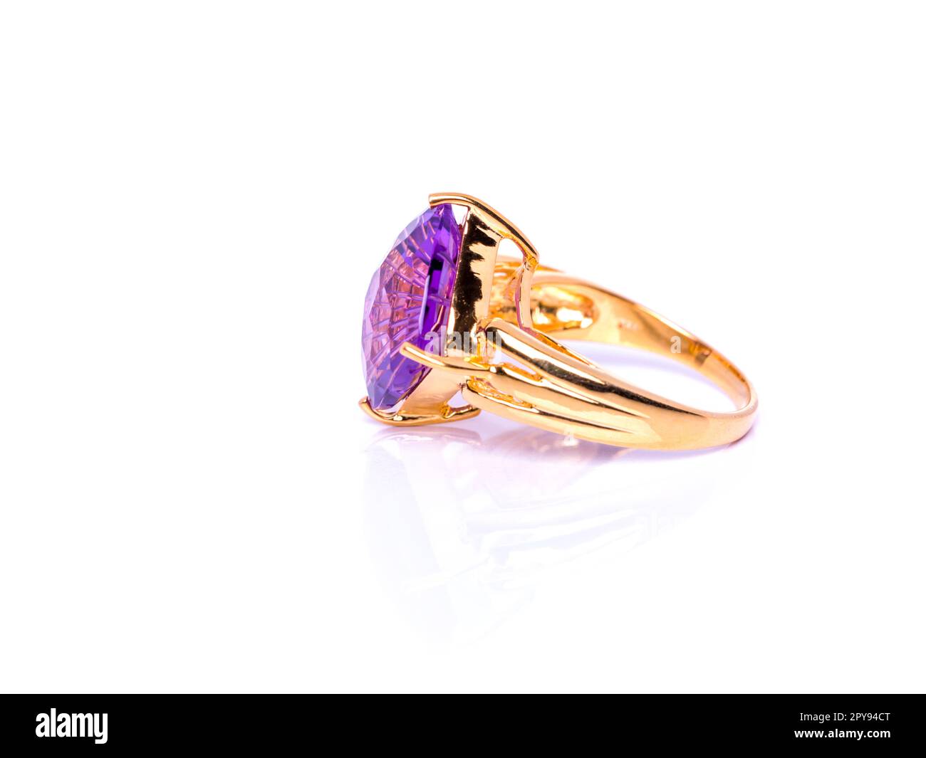 Amethyst Jewel or gems ring on white background with reflection ...