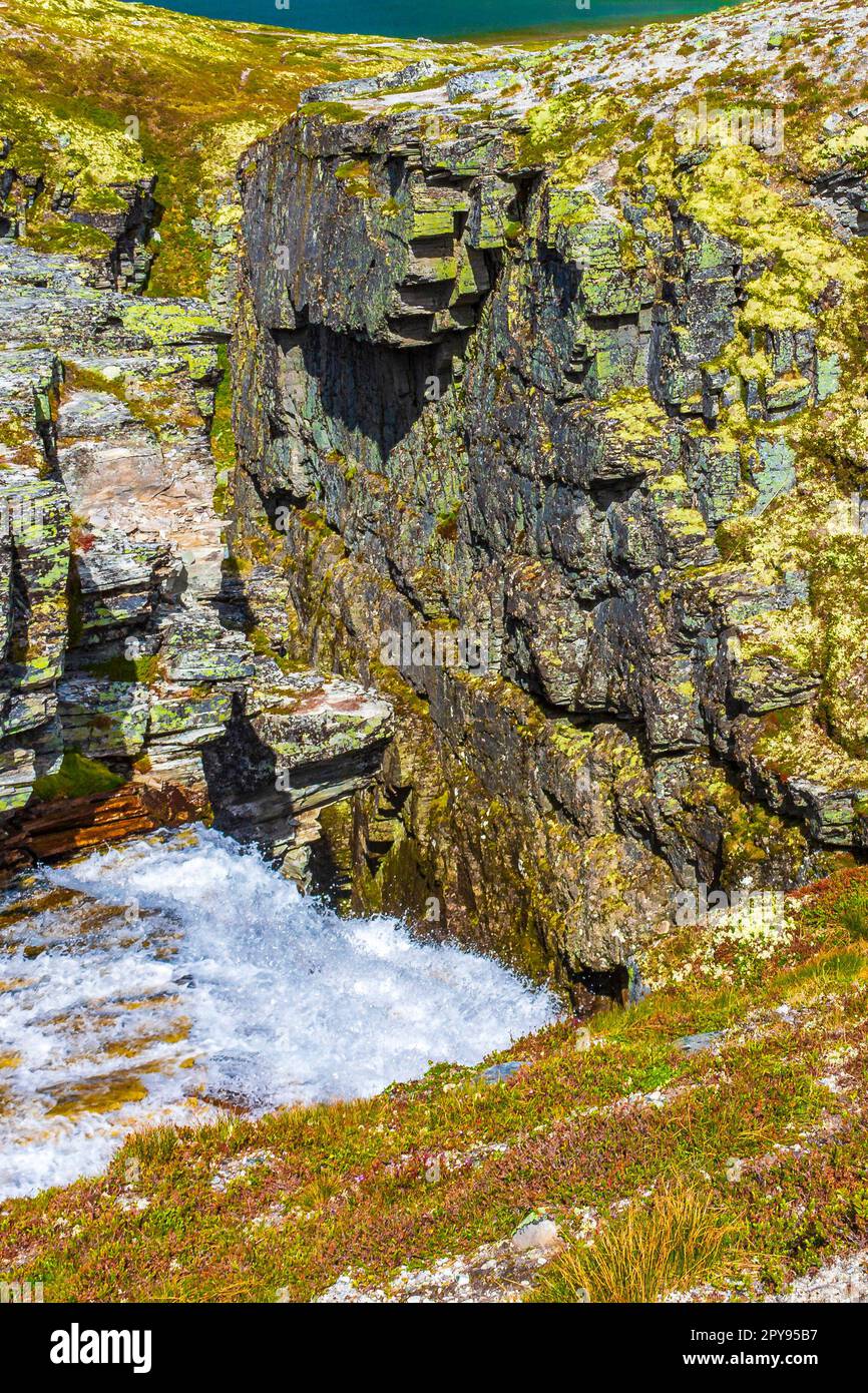 Gorge rocks cliff and waterfall river Rondane National Park Norway ...