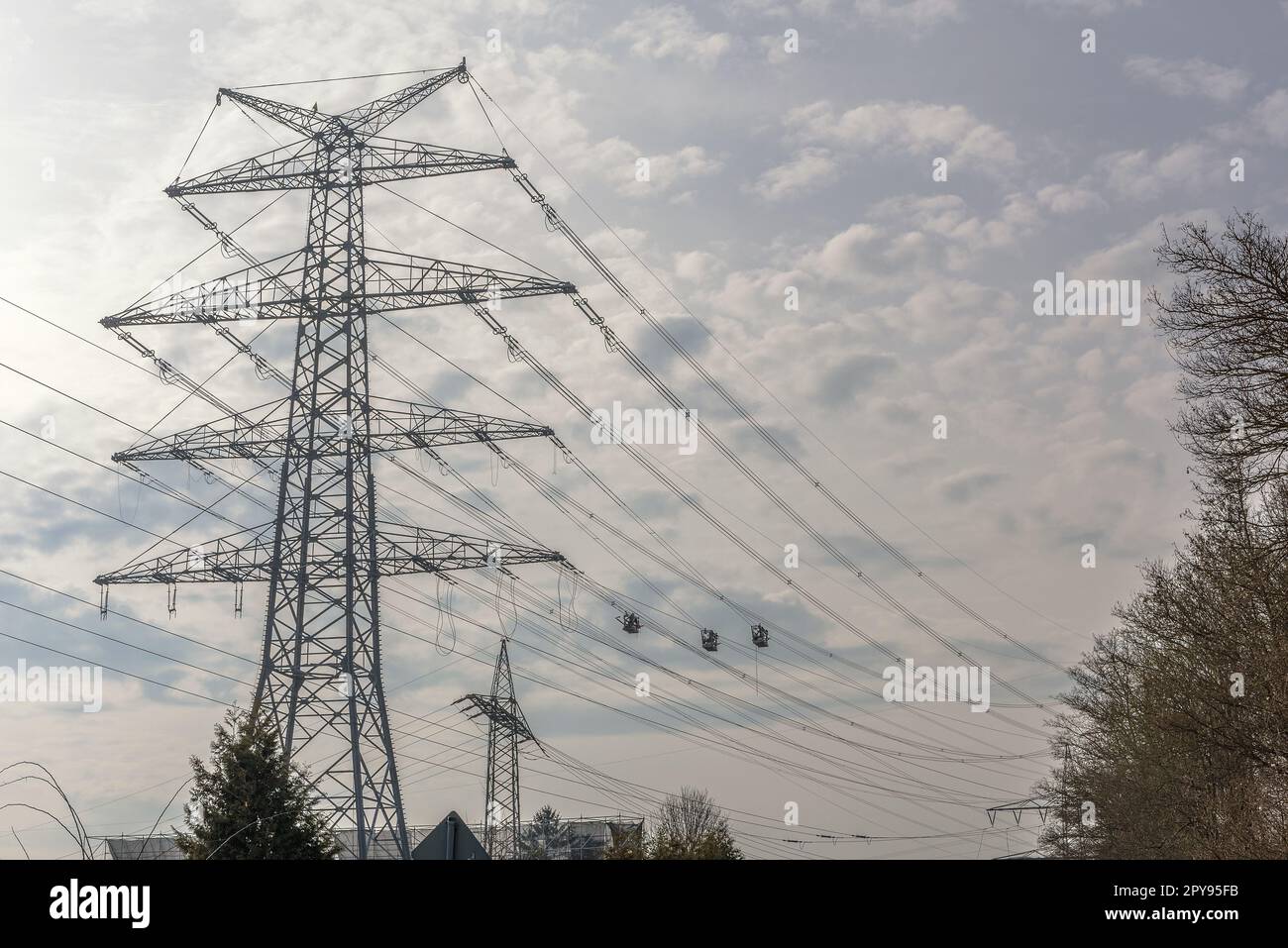 A newly installed high-voltage pylon with some cables connected Stock ...