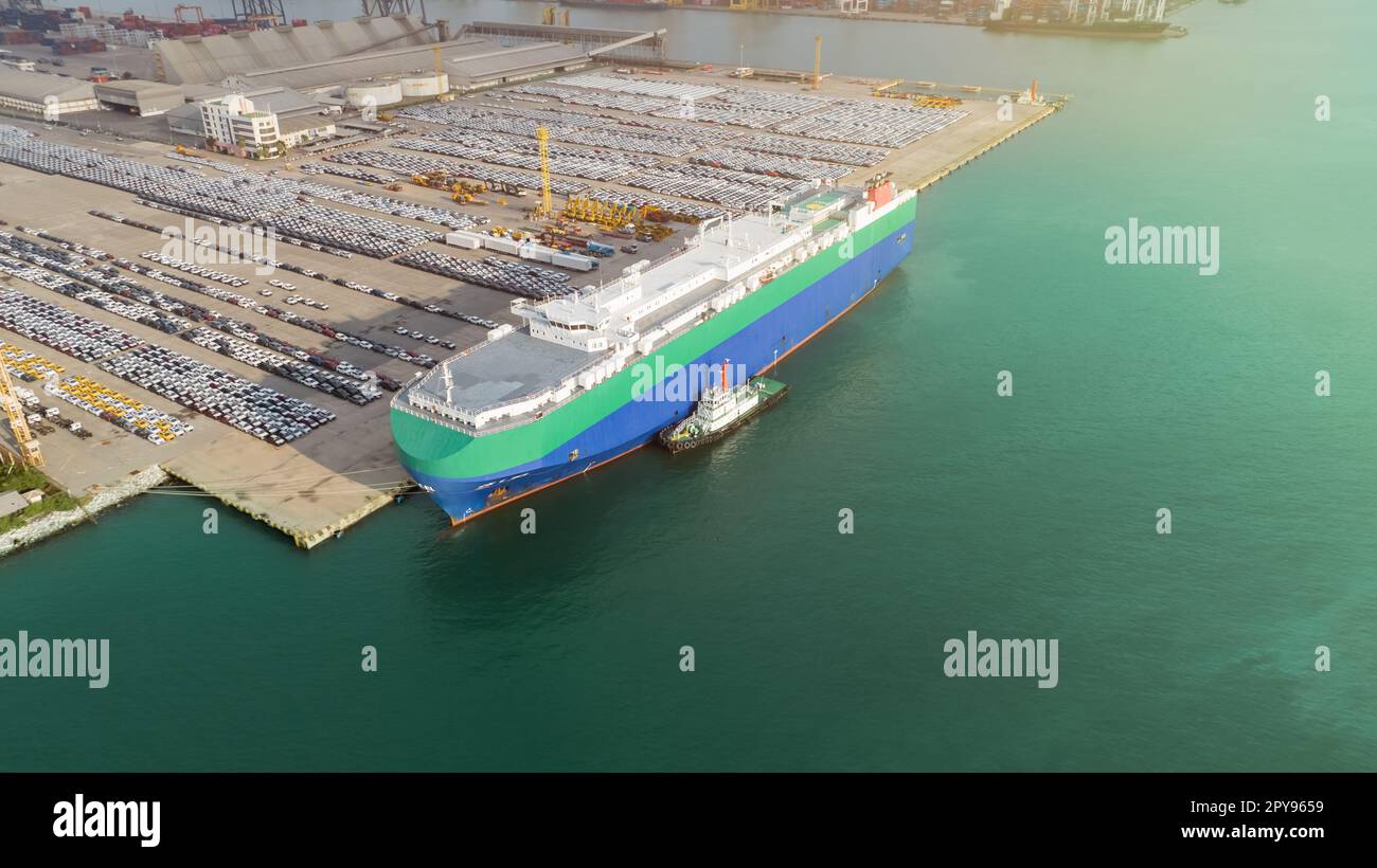 New cars lot at terminal port for export transport by ship. Cargo ship ...