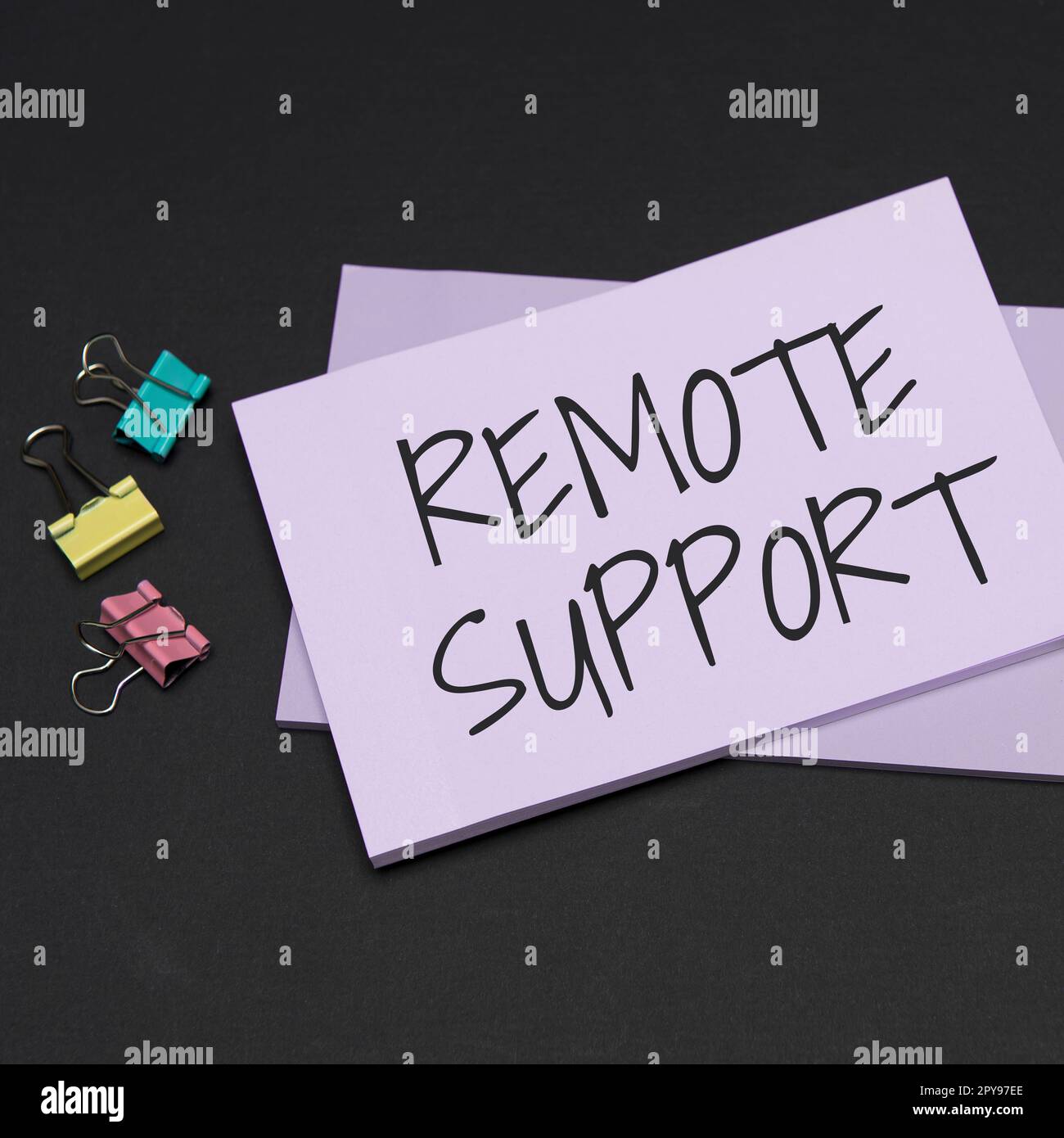 Hand writing sign Remote Support. Internet Concept help end-users to ...