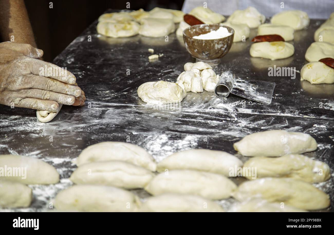 Female hands kneading bread hi-res stock photography and images - Alamy
