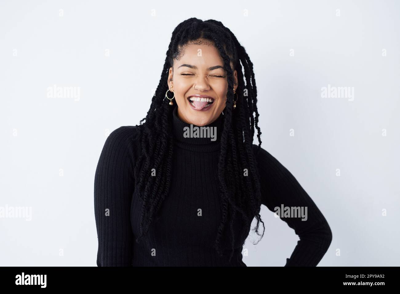 Happiness brings out a happy glow. Studio shot of a beautiful young ...