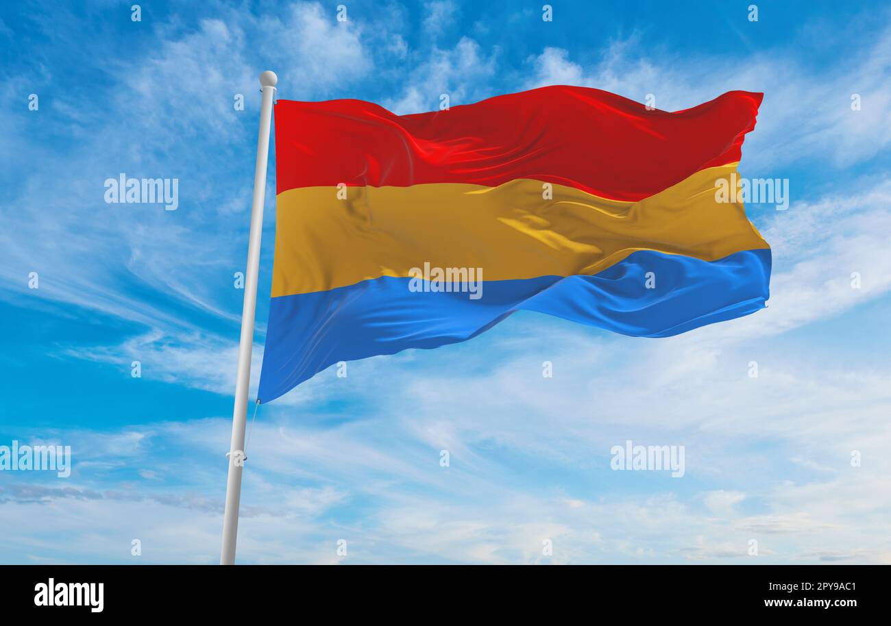 flag of Dravidian peoples Malayali people, Keralites at cloudy sky ...
