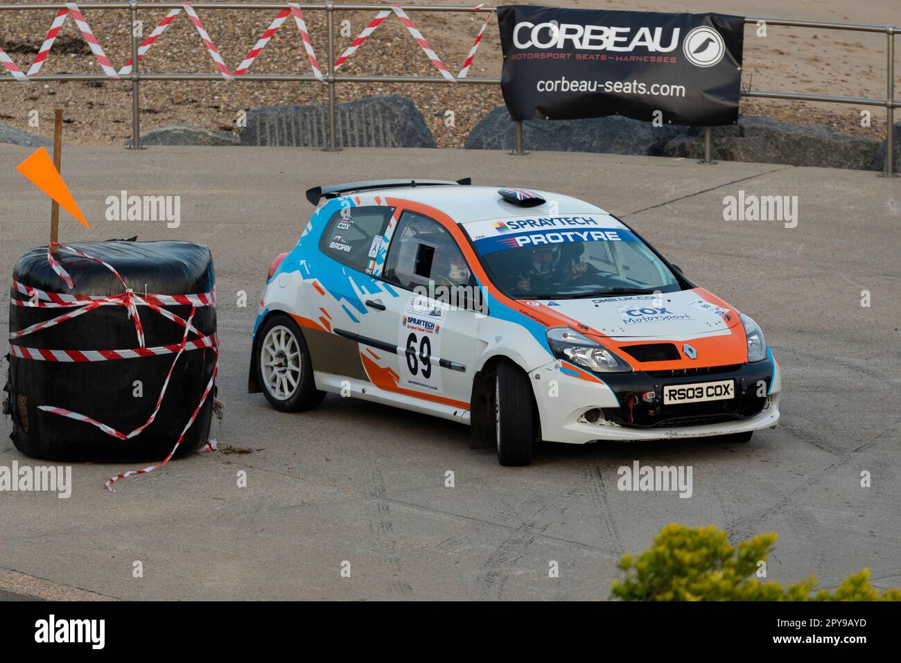 Sam Cox racing a 2010 Renault Clio Cup 3 competing in the Corbeau Seats ...