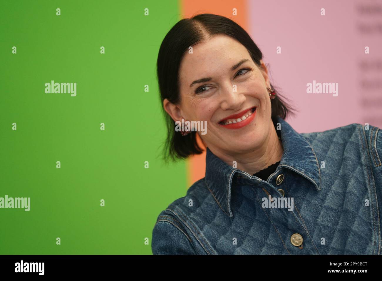 Hamburg, Germany. 03rd May, 2023. U.S. artist Sarah Morris sits in the Hall for Contemporary Art ...