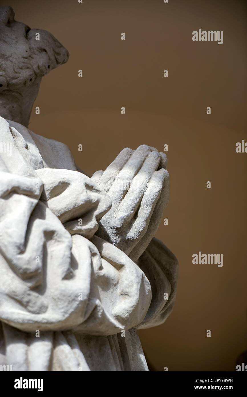 Statue of a man outside St James Church in Rothenburg Stock Photo - Alamy
