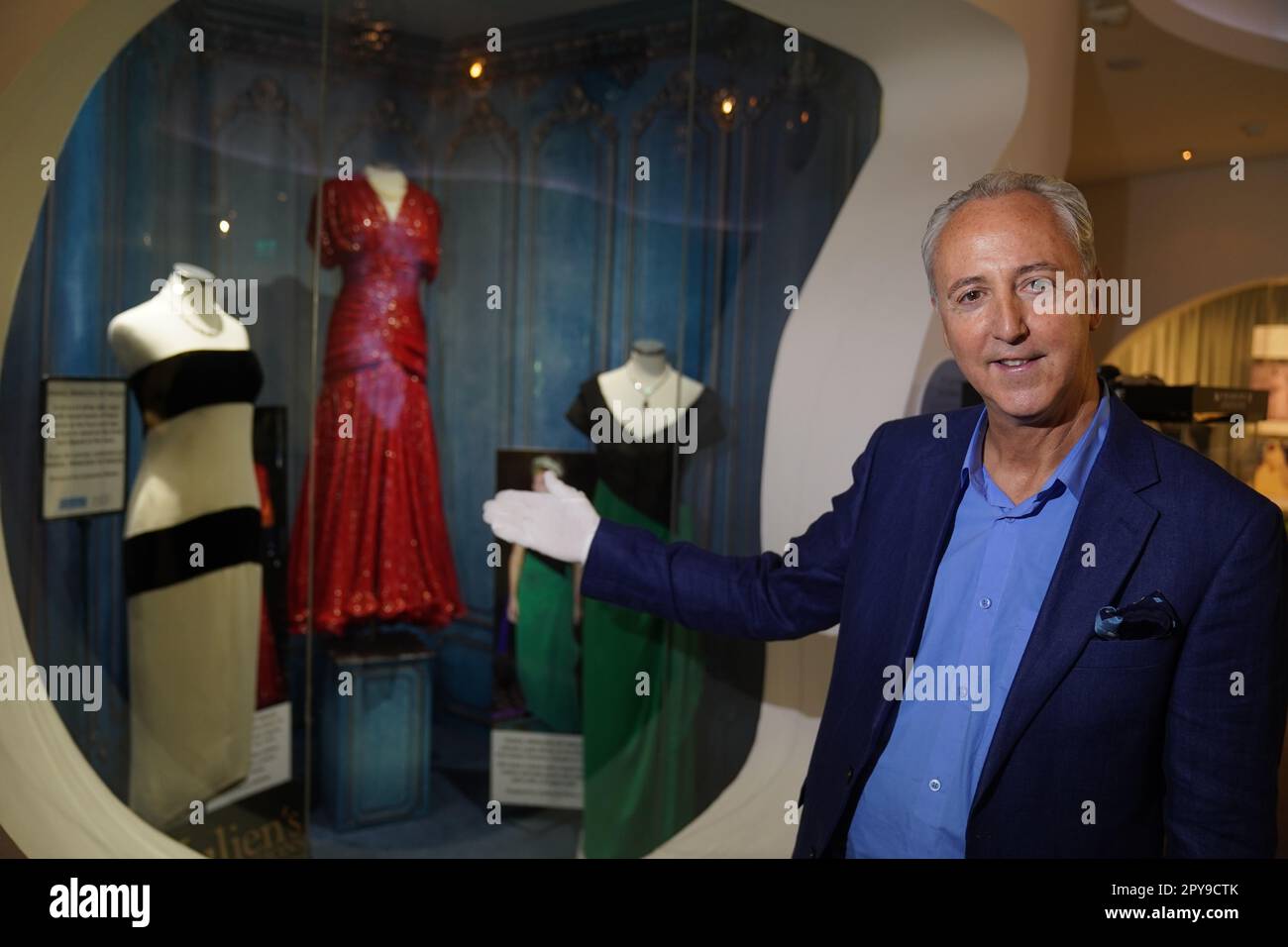 Martin Nolan, director of Julien's Auctions with dresses owned by the ...