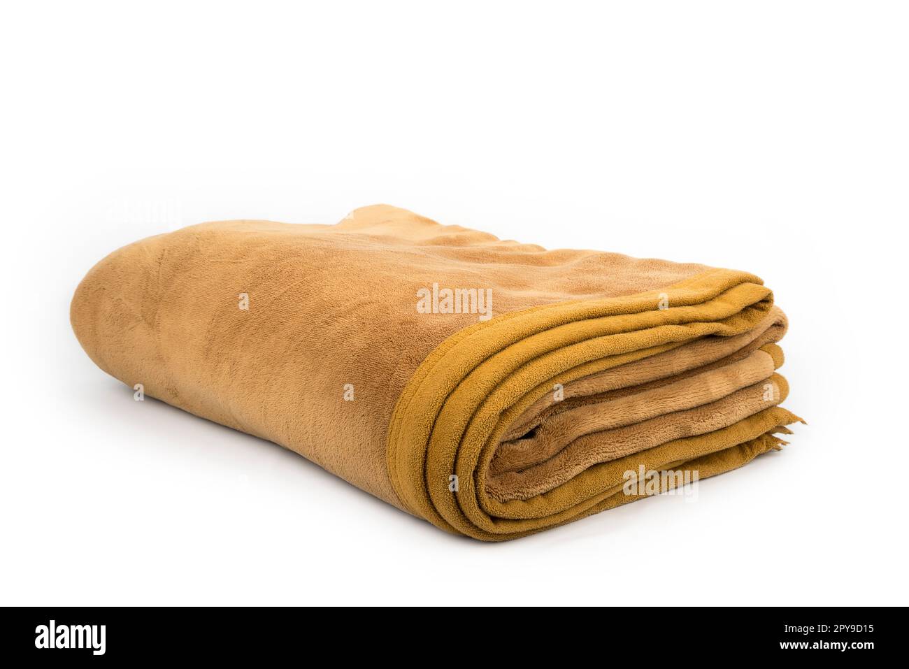 Brown folded blanket on a white background Stock Photo - Alamy