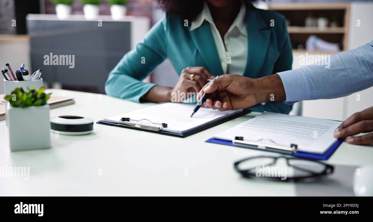 Two Businesspeople Hand Working Stock Photo - Alamy