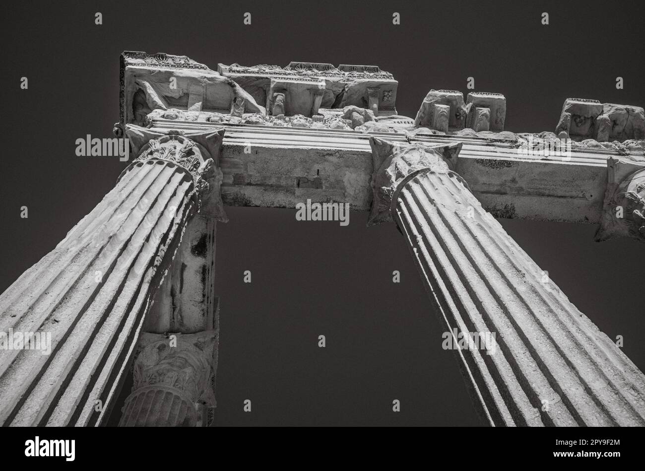 Looking up from the base of the awe-inspiring Temple of Apollo, a ...