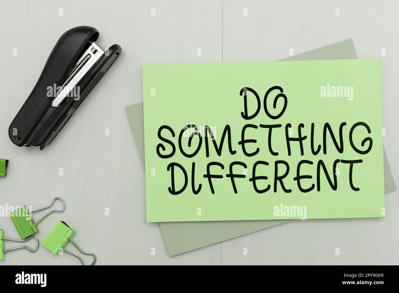 Hand writing sign Do Something Different. Business showcase be unique ...