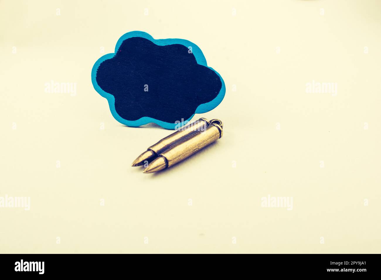 Bullet and speech bubble as Conceptual against the war Stock Photo - Alamy