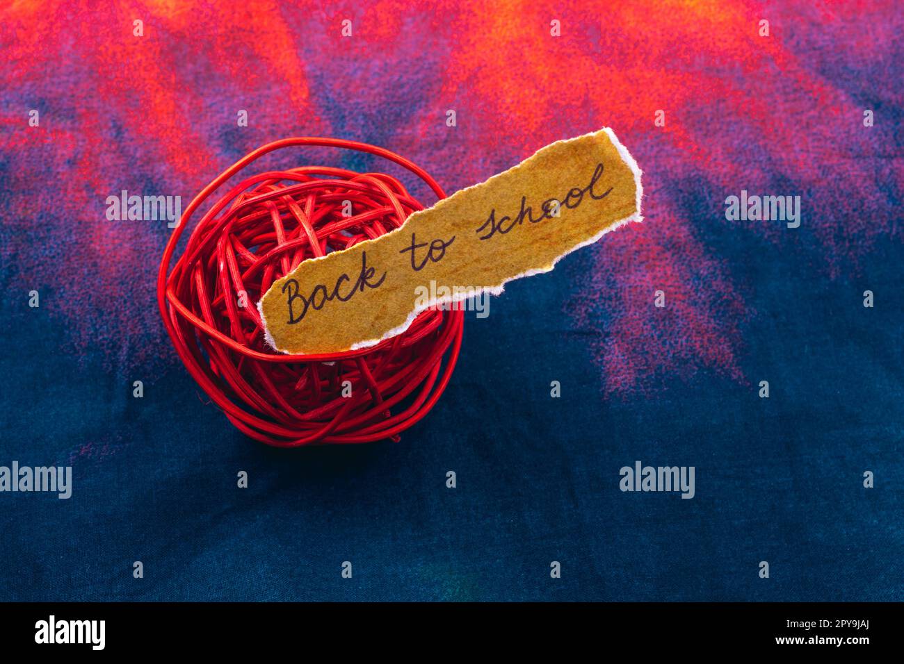 Back to school wording on a piece of torn paper Stock Photo - Alamy