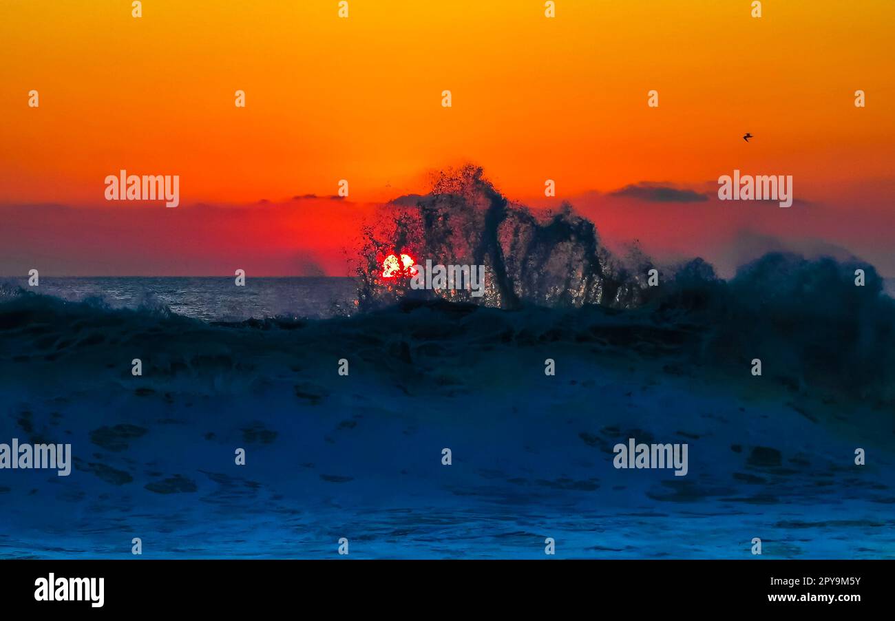 Colorful golden sunset big wave and beach Puerto Escondido Mexico Stock ...