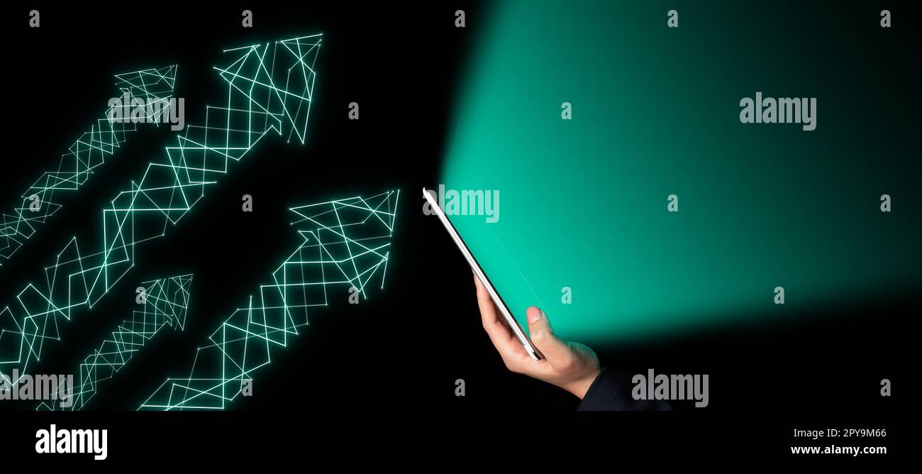 Hand holding Mobile Phone with glow from the screen. Display Receiving ...