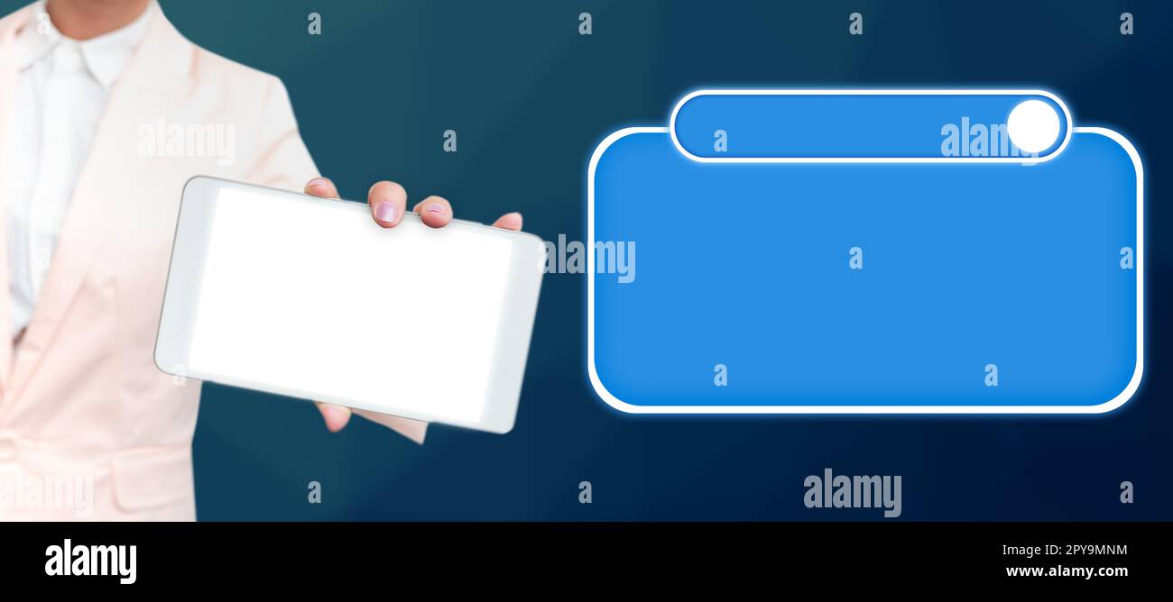 Lady in white office suit standing and holding mobile phone in her hand ...
