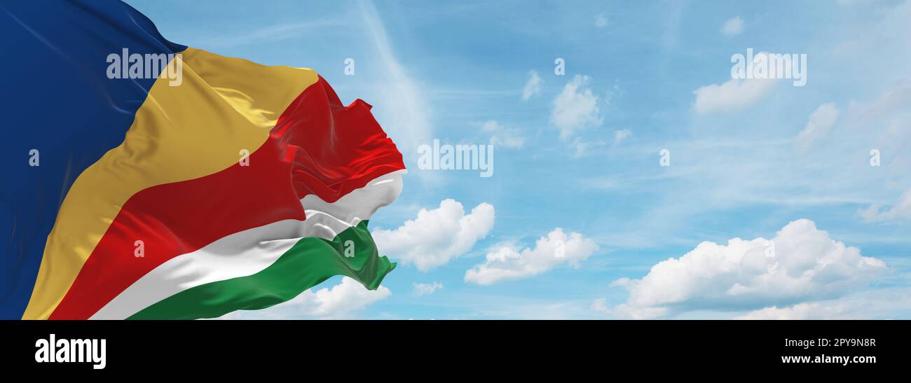 flag of French Creole peoples Seychellois people at cloudy sky ...