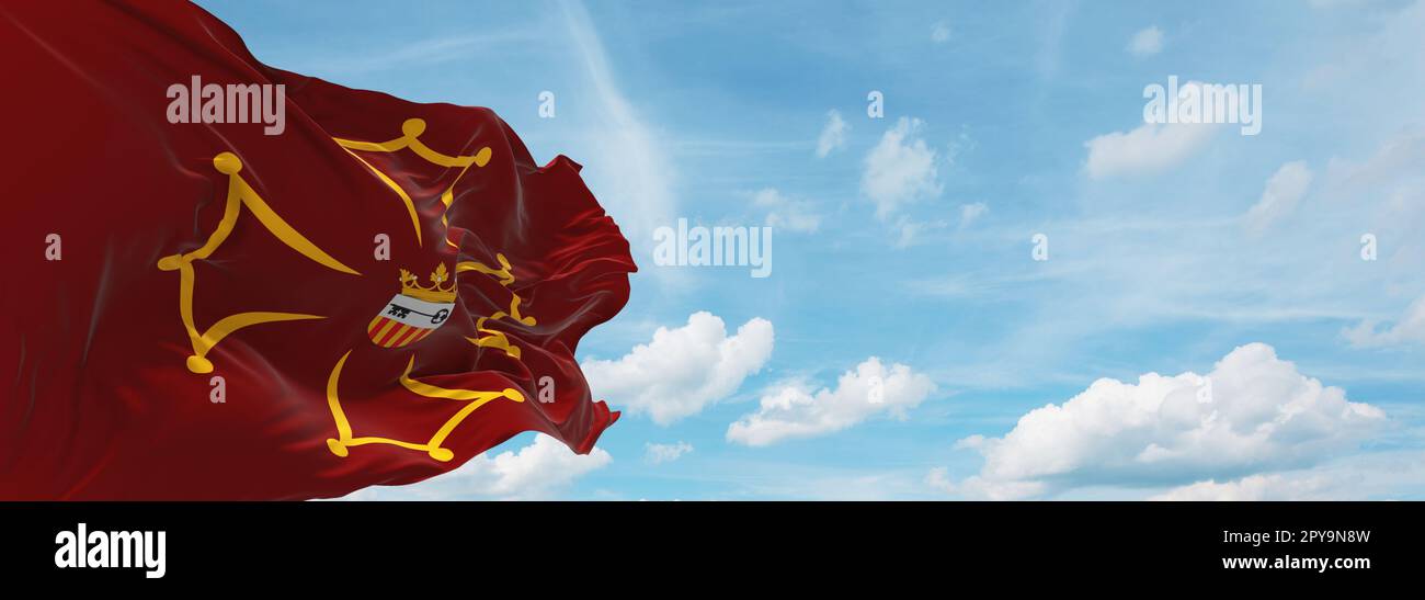 flag of Gallo-Romance peoples Aranese people at cloudy sky background ...