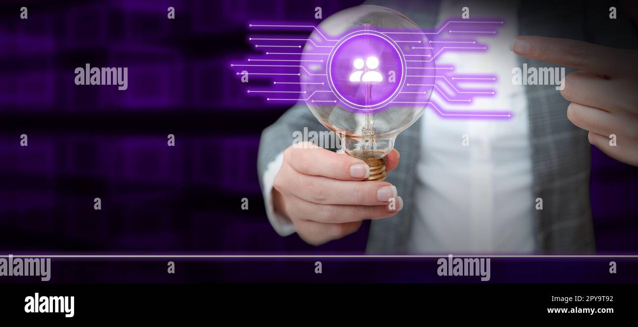 Lady in suit holding light bulb representing innovative thinking ...