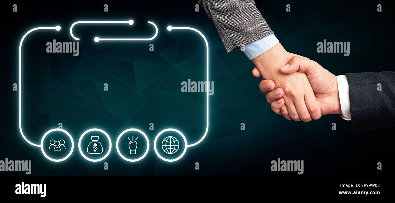 Handshake presenting innovative plan ideas symbolizing successful ...