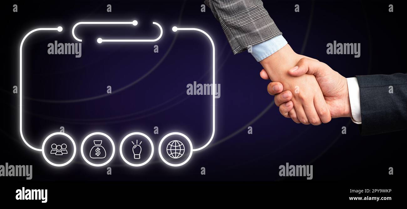 Handshake presenting innovative plan ideas symbolizing successful ...