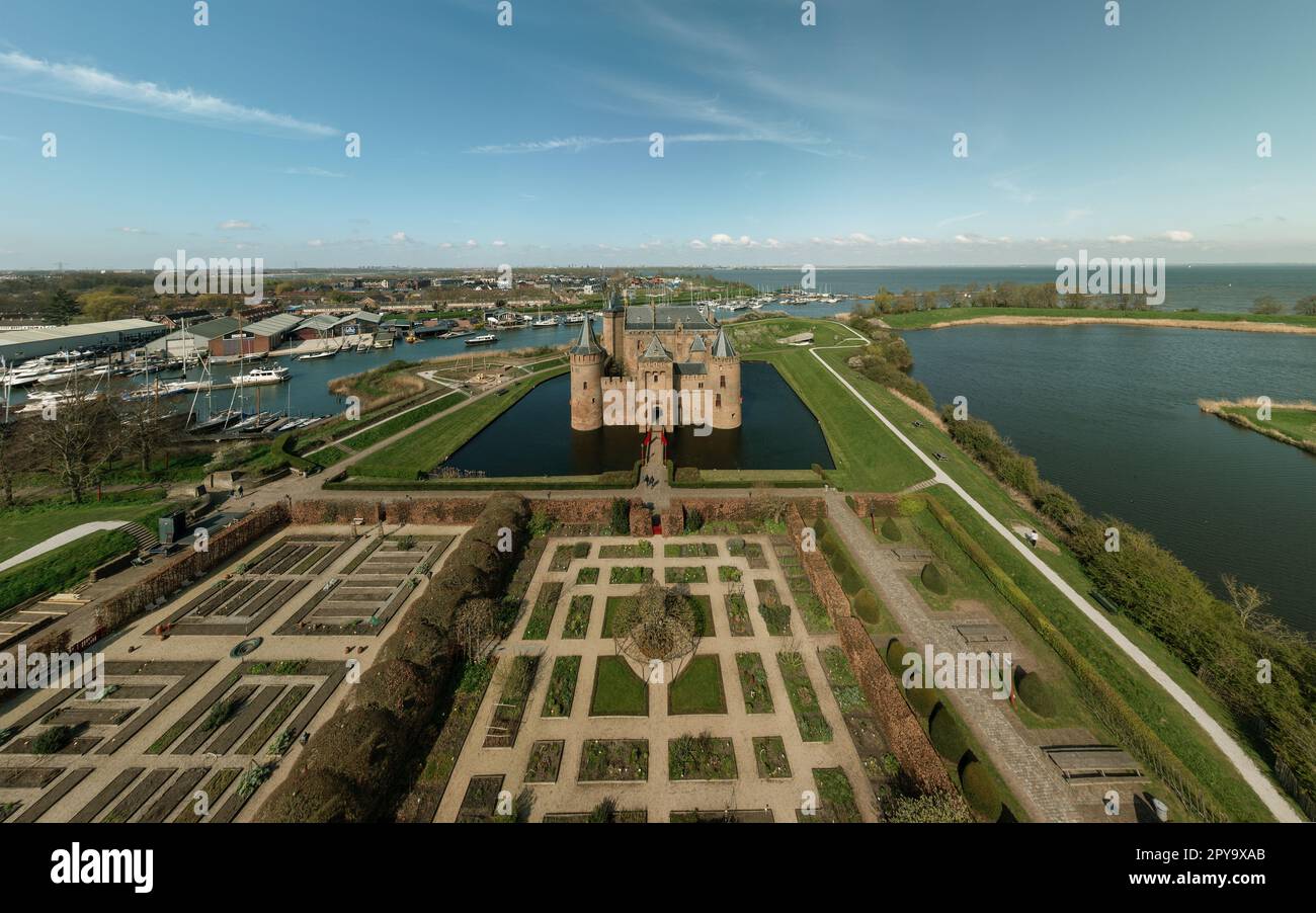 Muiden Castle in Netherlands. Medieval fortress surrounded by a moat ...