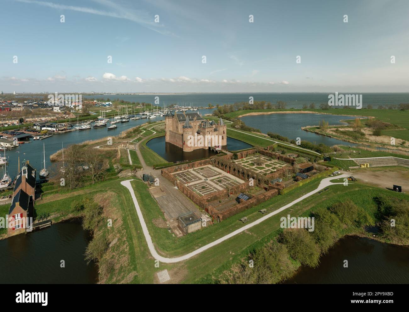Muiden Castle in Netherlands. Medieval fortress surrounded by a moat ...