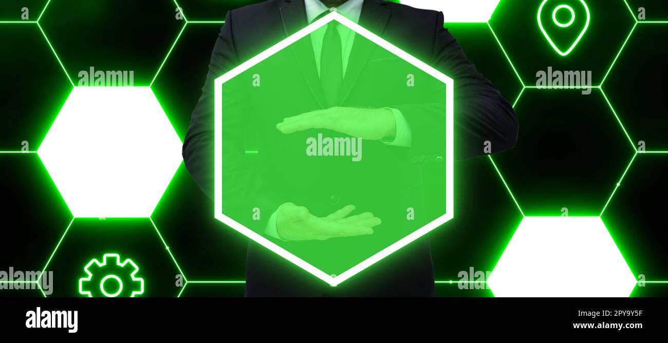 Businessman in office suit holding futuristic frame with glow in his ...