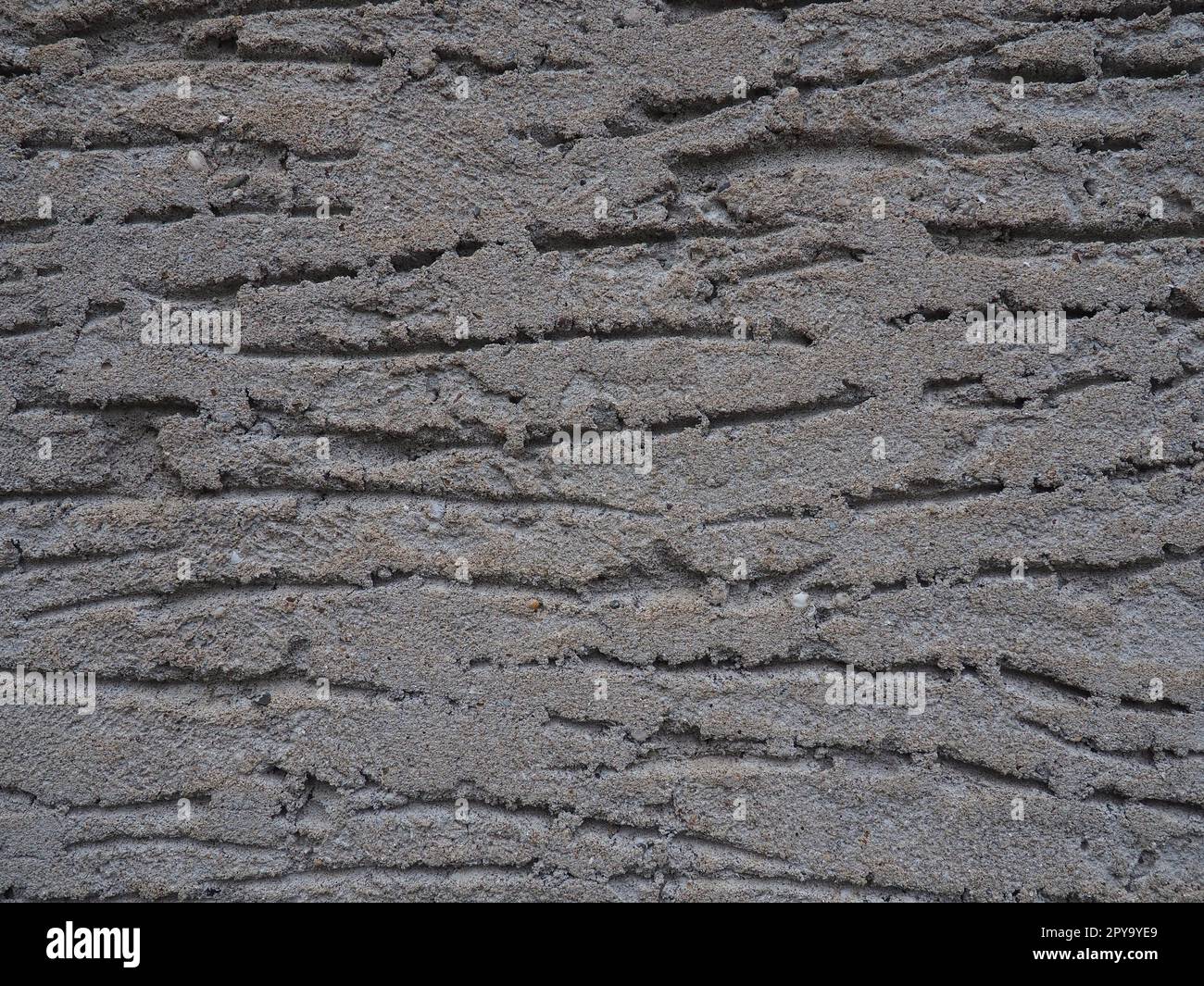 Texture of concrete and plaster on the wall. Drips on the wall. Wavy ...