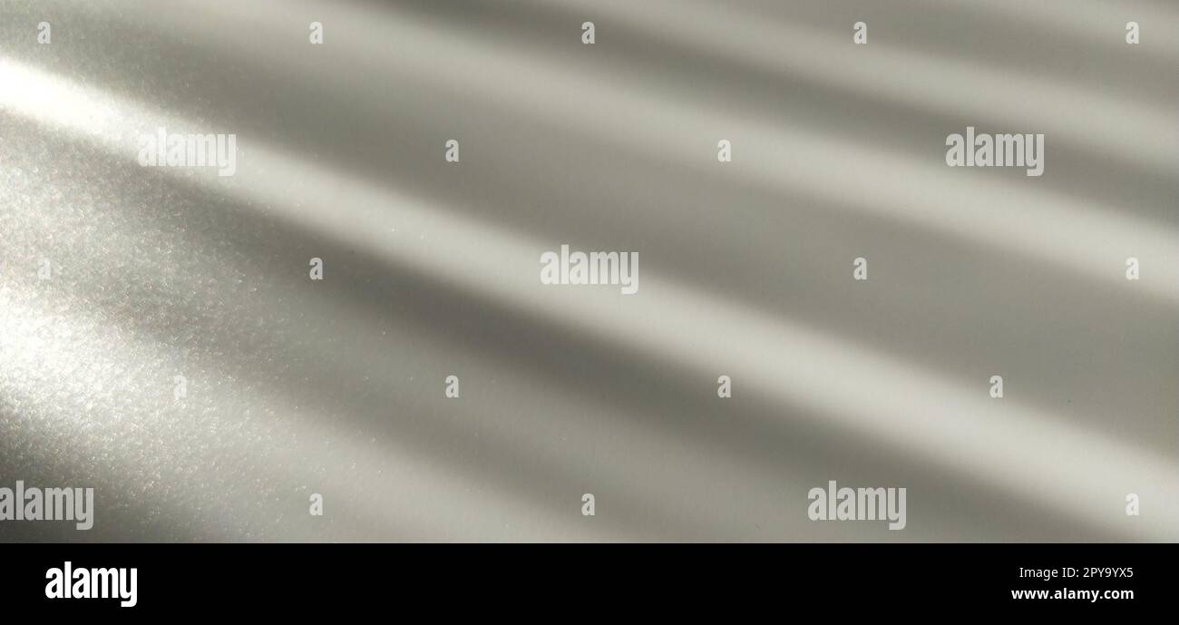 Gray striped background with oblique light effect. Play of light and ...