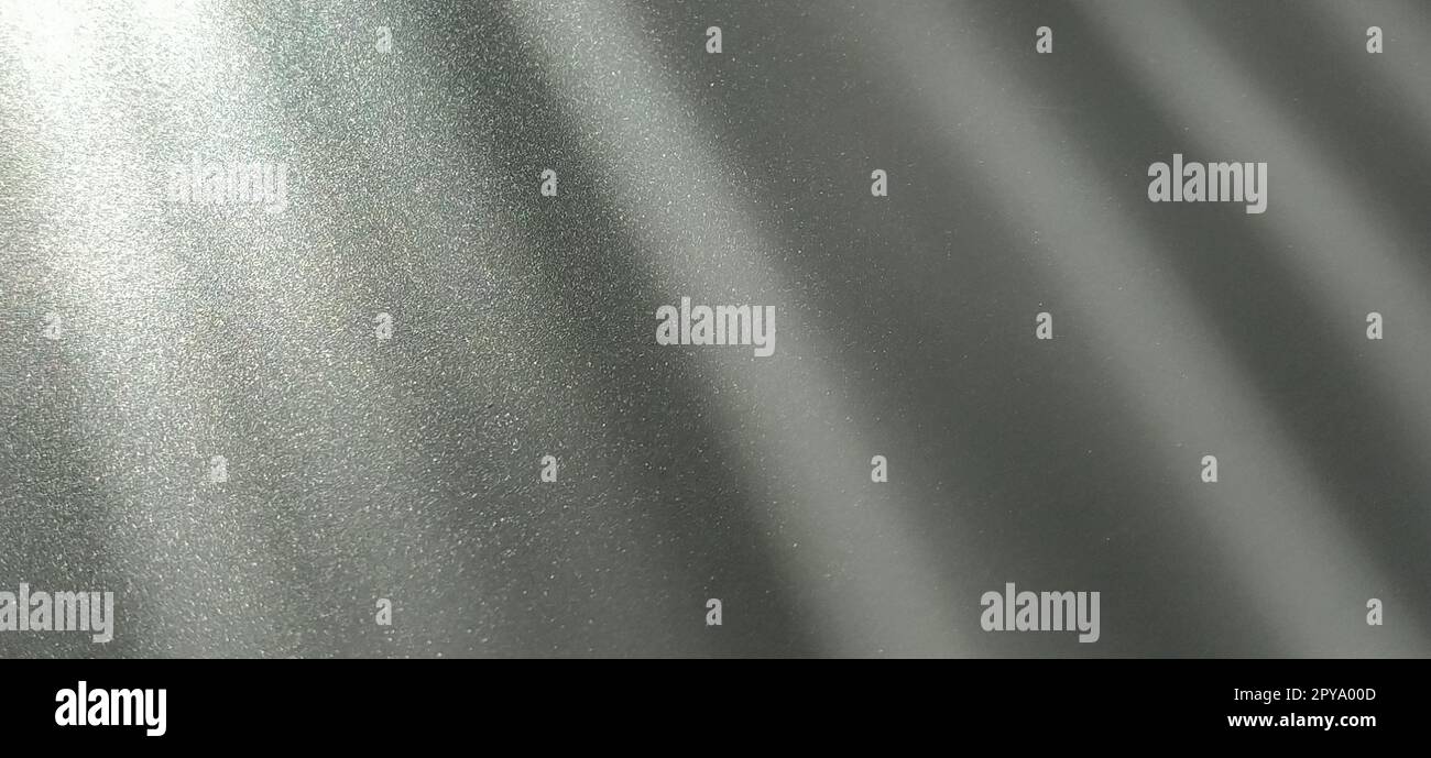 Gray striped background with oblique light effect. Play of light and ...