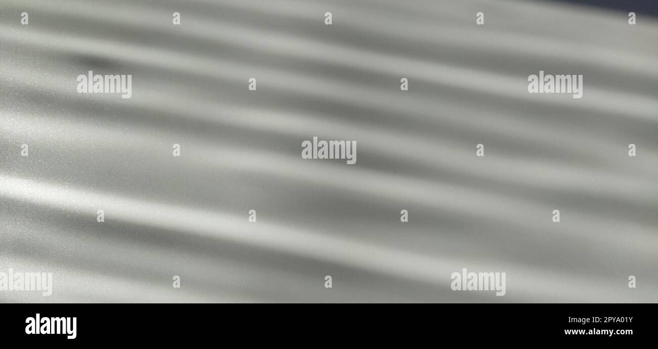 Gray striped background with oblique light effect. Play of light and ...
