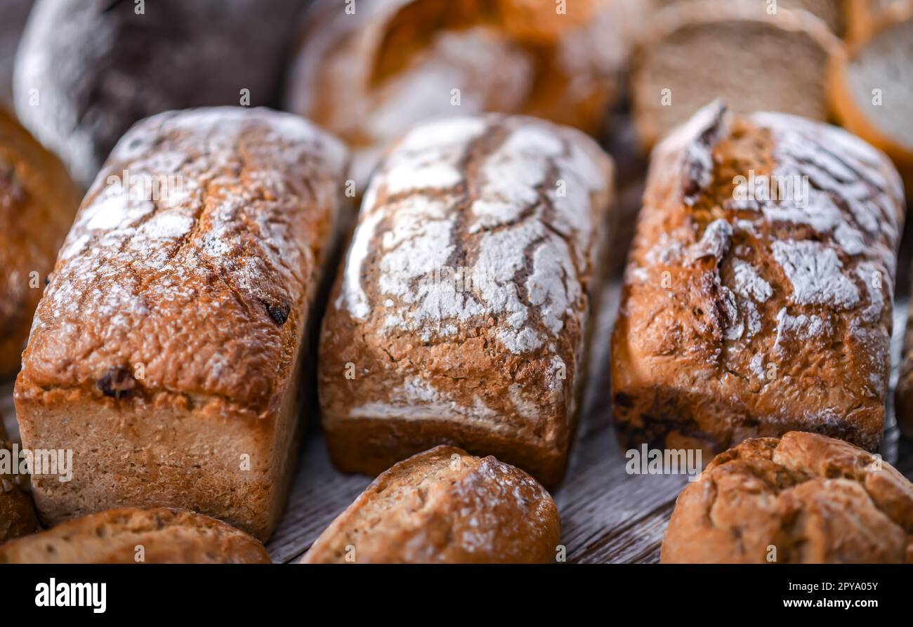 Assorted bakery products including loaves of bread and rolls Stock ...