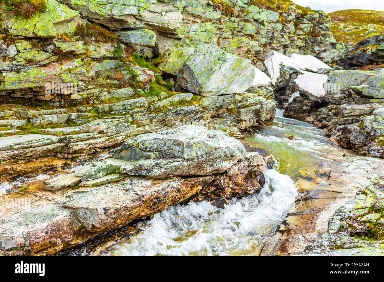Gorge rocks cliff and waterfall river Rondane National Park Norway ...